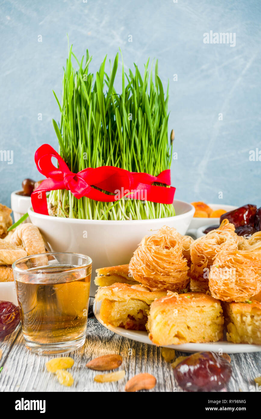 Happy Nowruz holiday background. Celebrating Nowruz sweets and treats ...