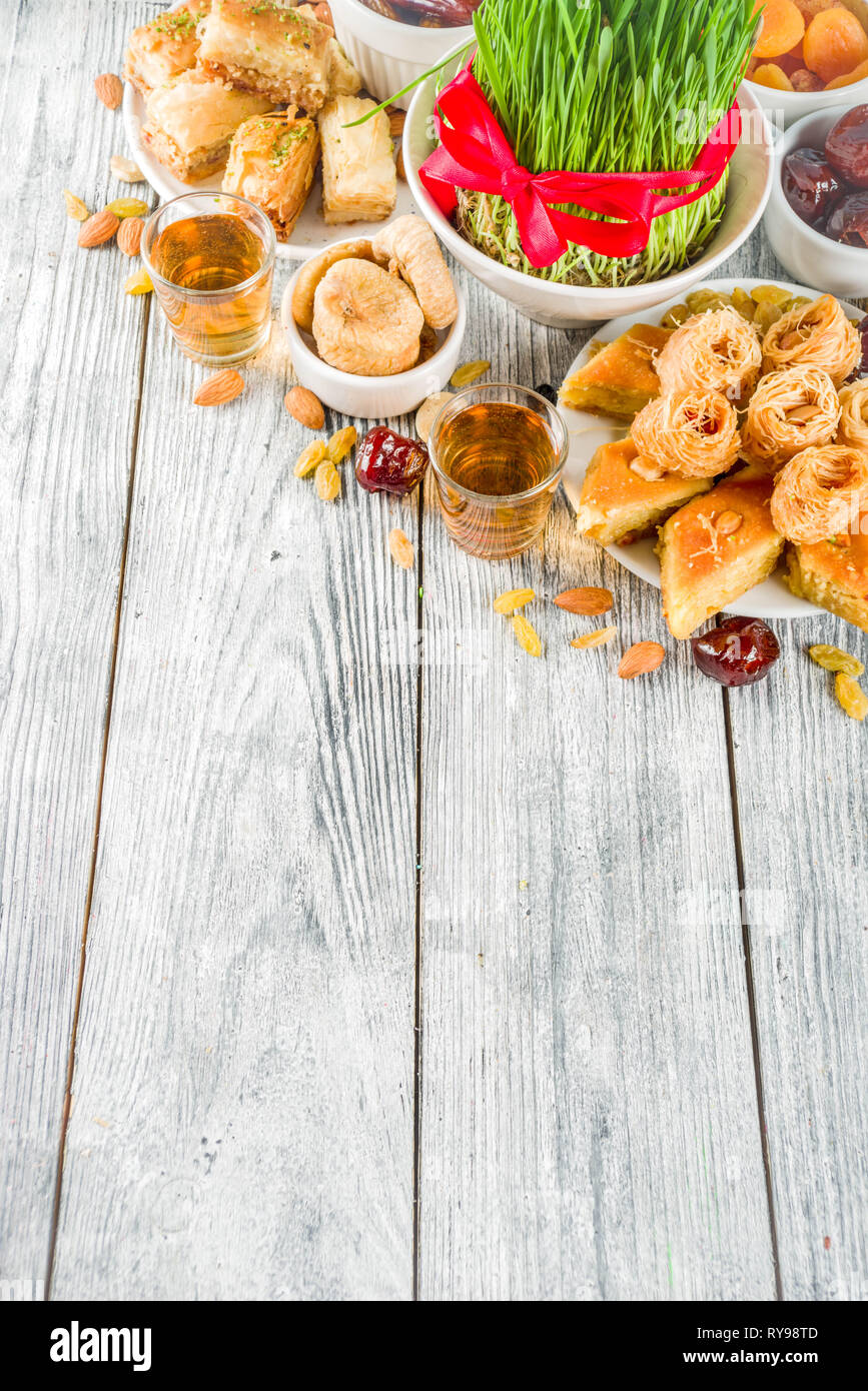 Happy Nowruz holiday background. Celebrating Nowruz sweets and treats ...