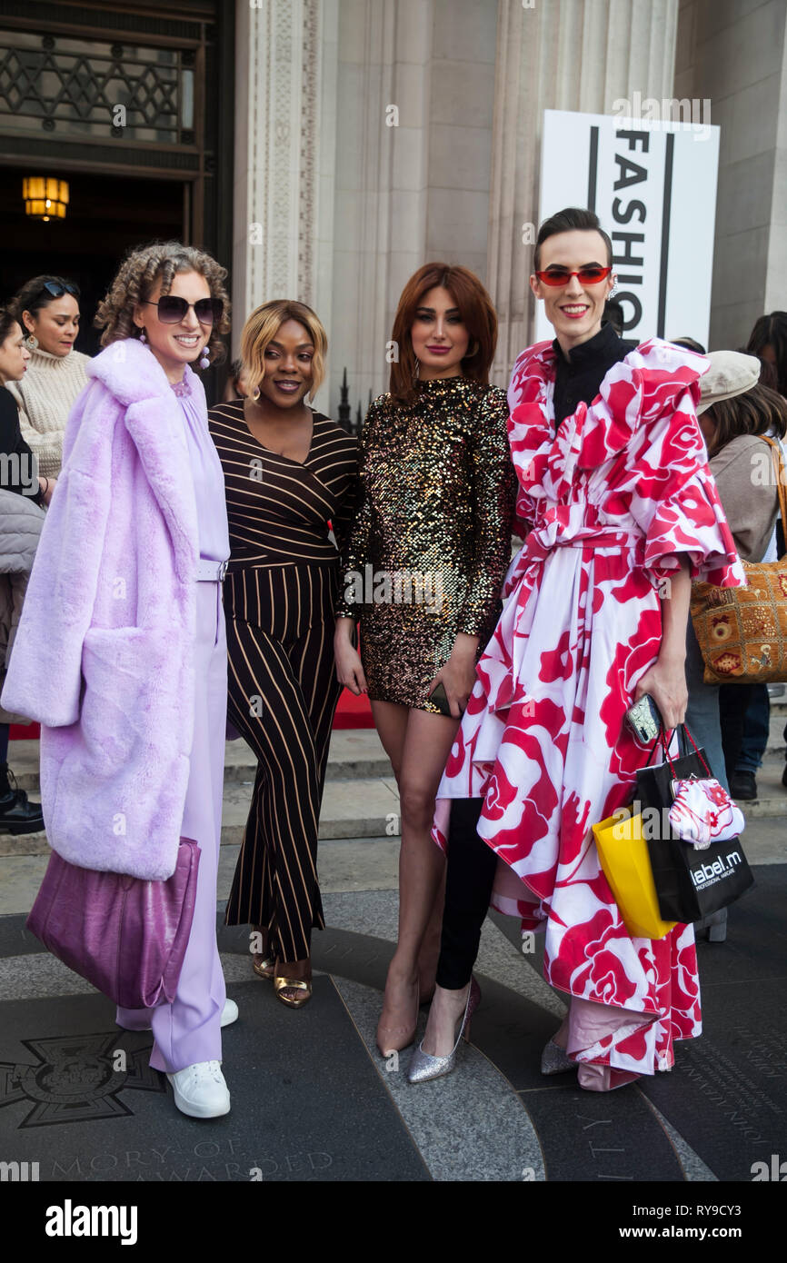LONDON - FEBRUARY 17, 2019: Stylish attendees gathering outside 180 The ...