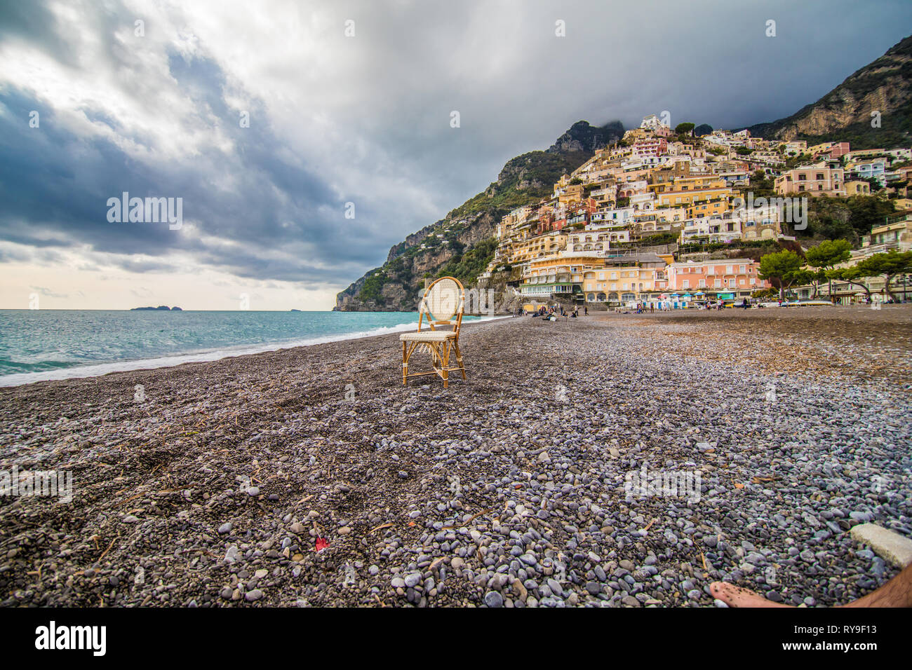 Panoramic view of the beach and colorful buildings of Positano, Italy ...