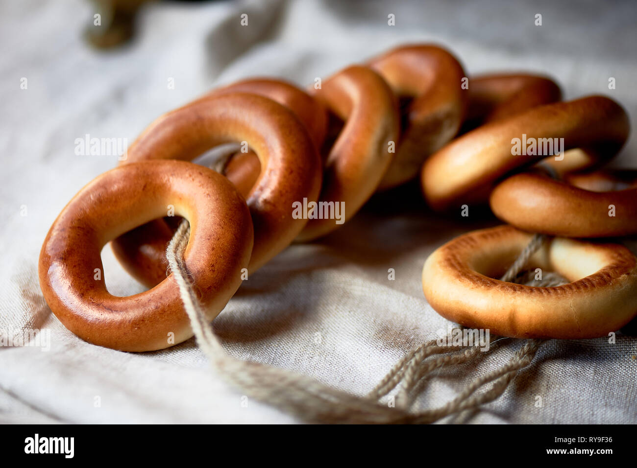 Donut on a string hi-res stock photography and images - Alamy