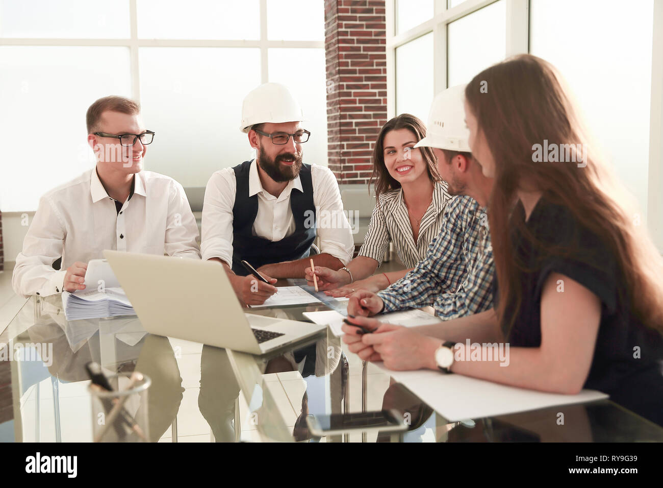 creative design team discussing new commercial project Stock Photo - Alamy