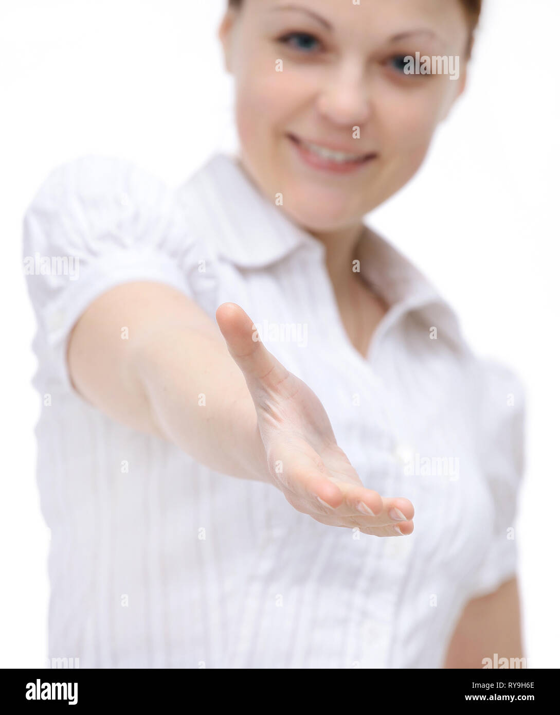 young woman employee holding out his hand for a handshake Stock Photo ...