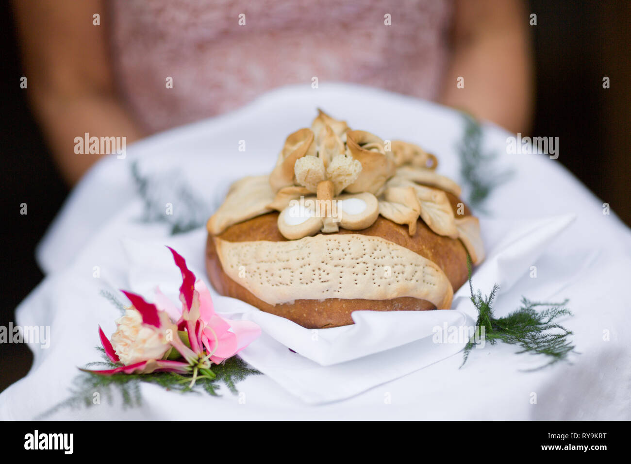 Wedding bread with salt detail on hands- traditional polish inviting to ...