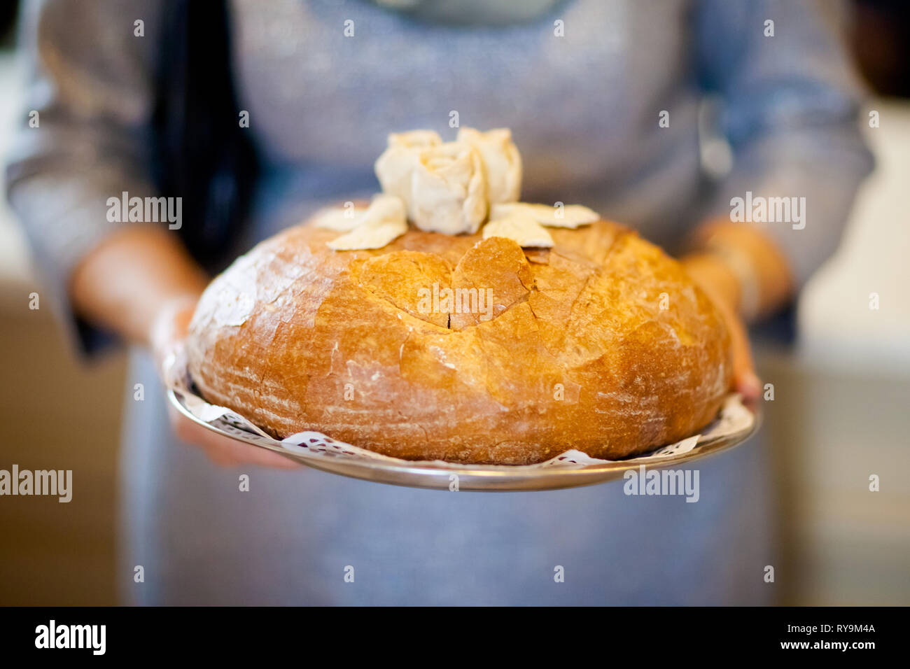 Wedding bread with salt detail on hands - traditional polish inviting ...
