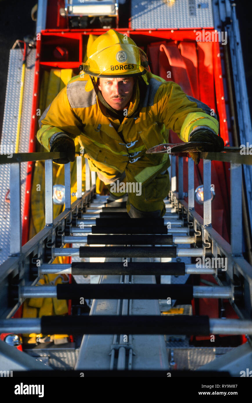 Yellow fireman helmet hi-res stock photography and images - Alamy