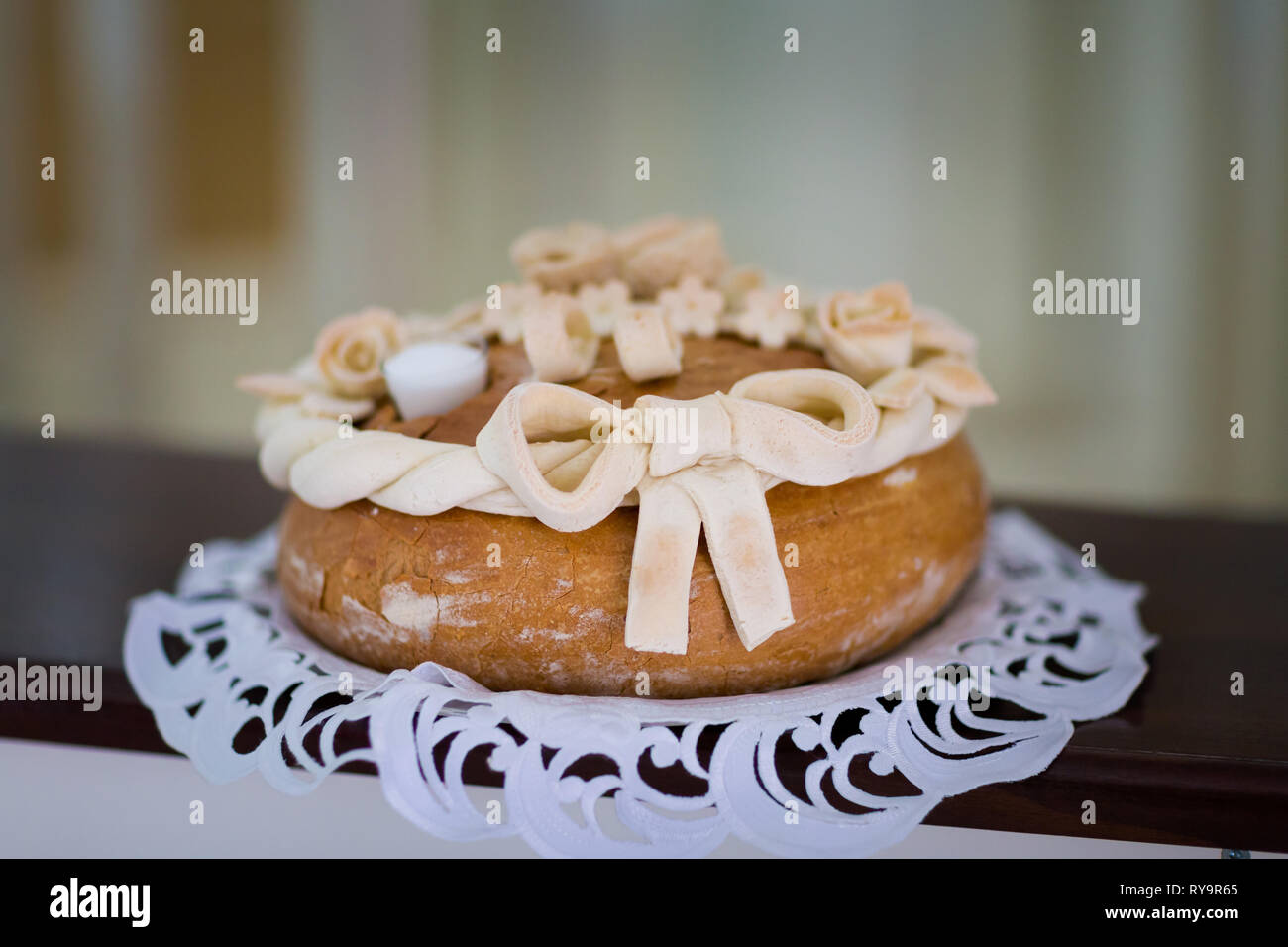 Wedding bread with salt detail on hands- traditional polish inviting to ...