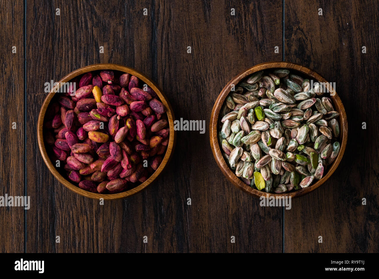 Raw and Roasted Wooden Bowl of Peeled Pistachios without Shell / with ...
