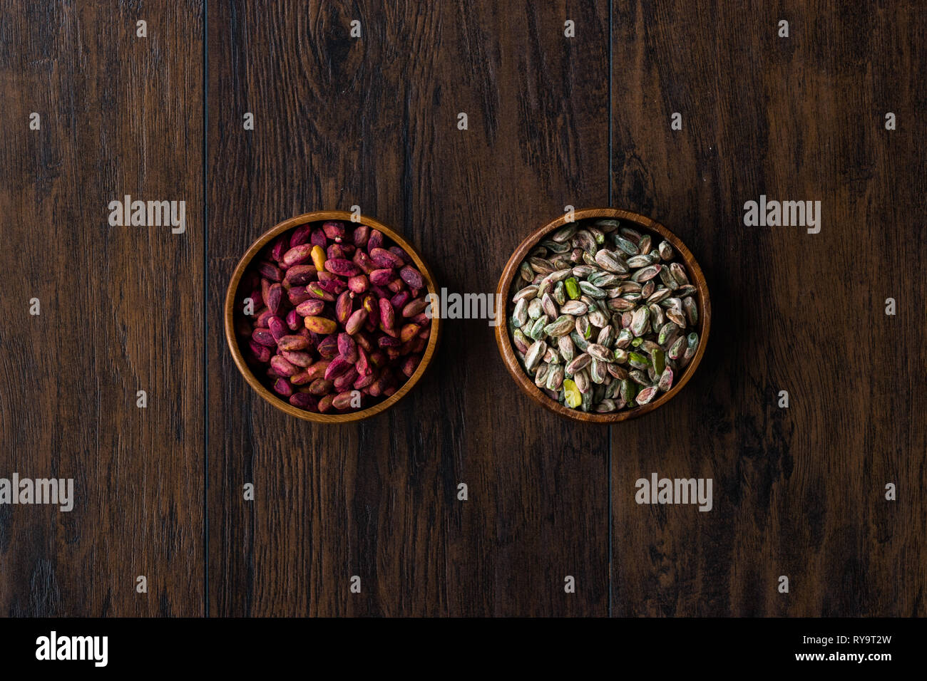 Raw and Roasted Wooden Bowl of Peeled Pistachios without Shell / with ...