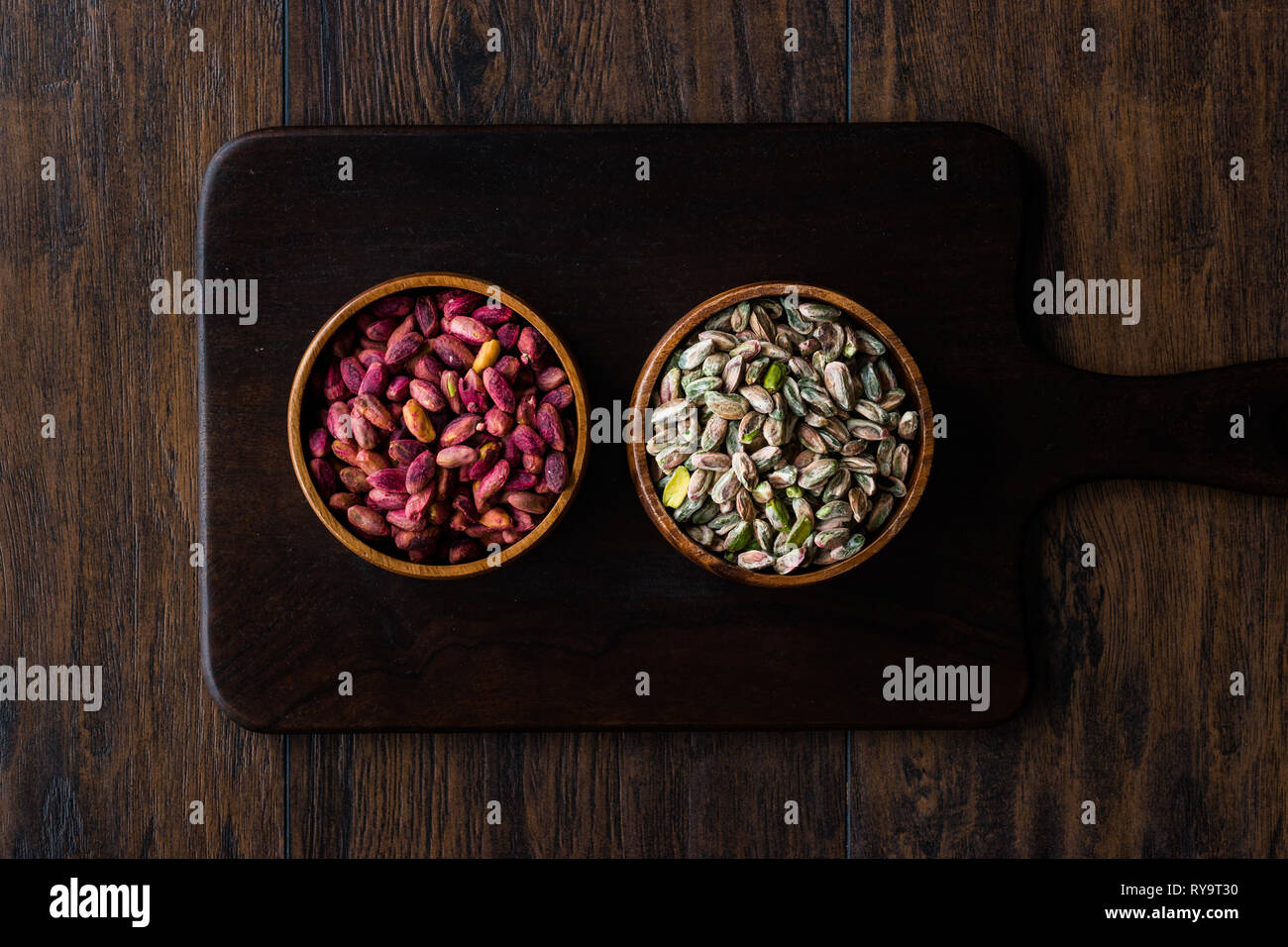 Raw and Roasted Wooden Bowl of Peeled Pistachios without Shell / with ...