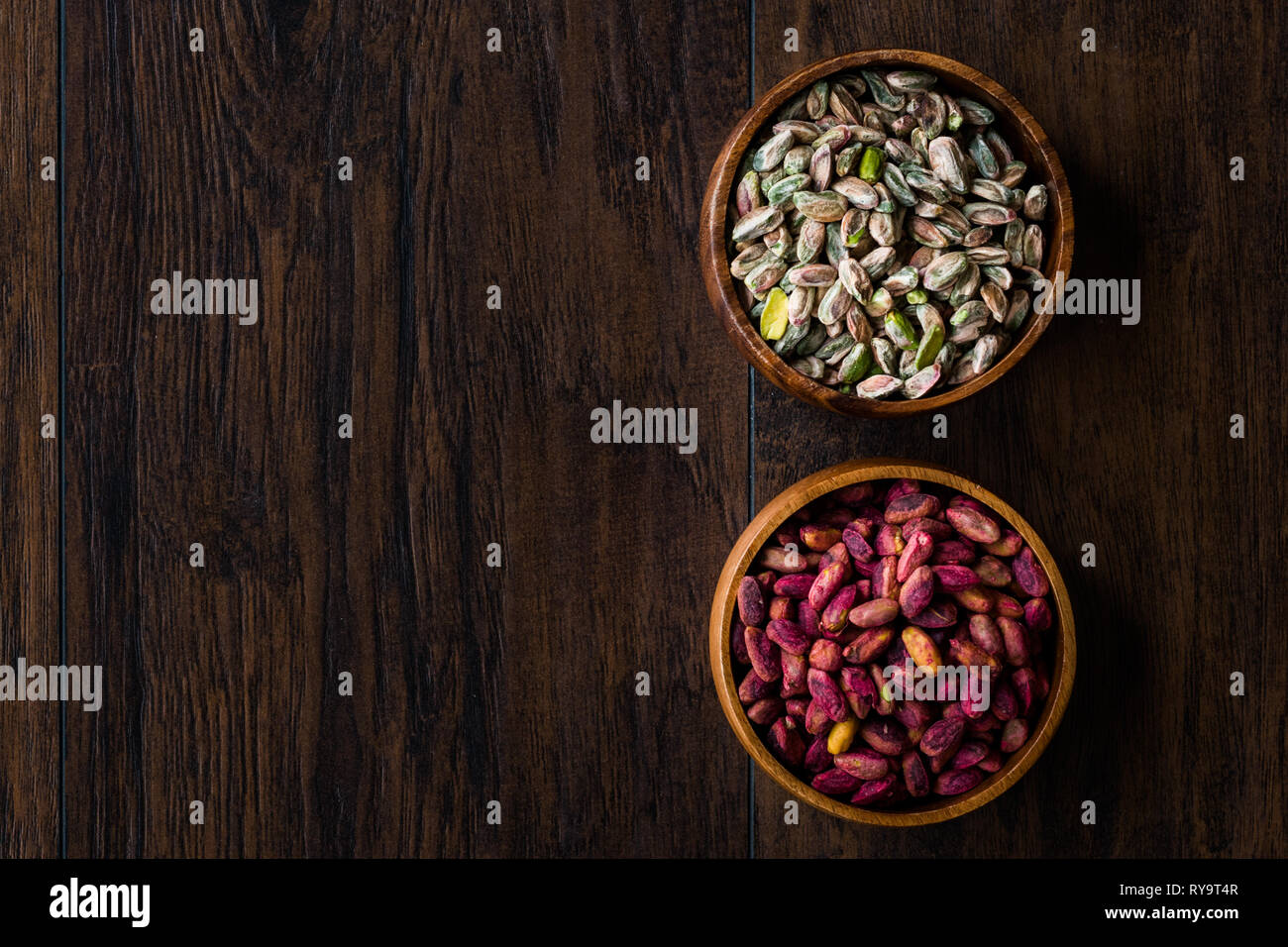 Raw and Roasted Wooden Bowl of Peeled Pistachios without Shell / with ...