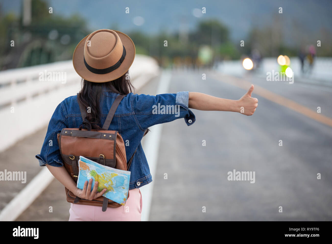 Female driver waving hand hi-res stock photography and images - Alamy