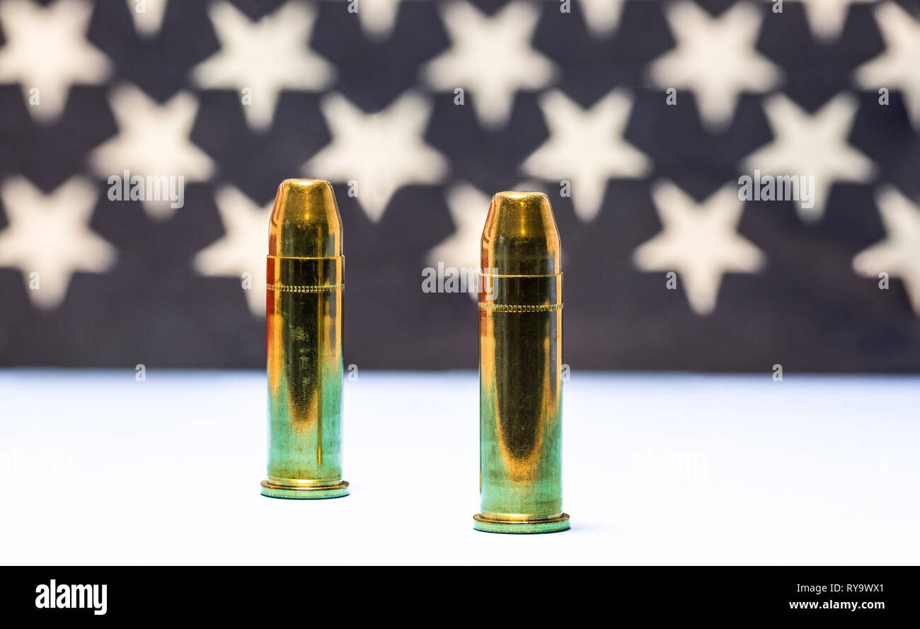 Bullets in front of US flag Stock Photo - Alamy
