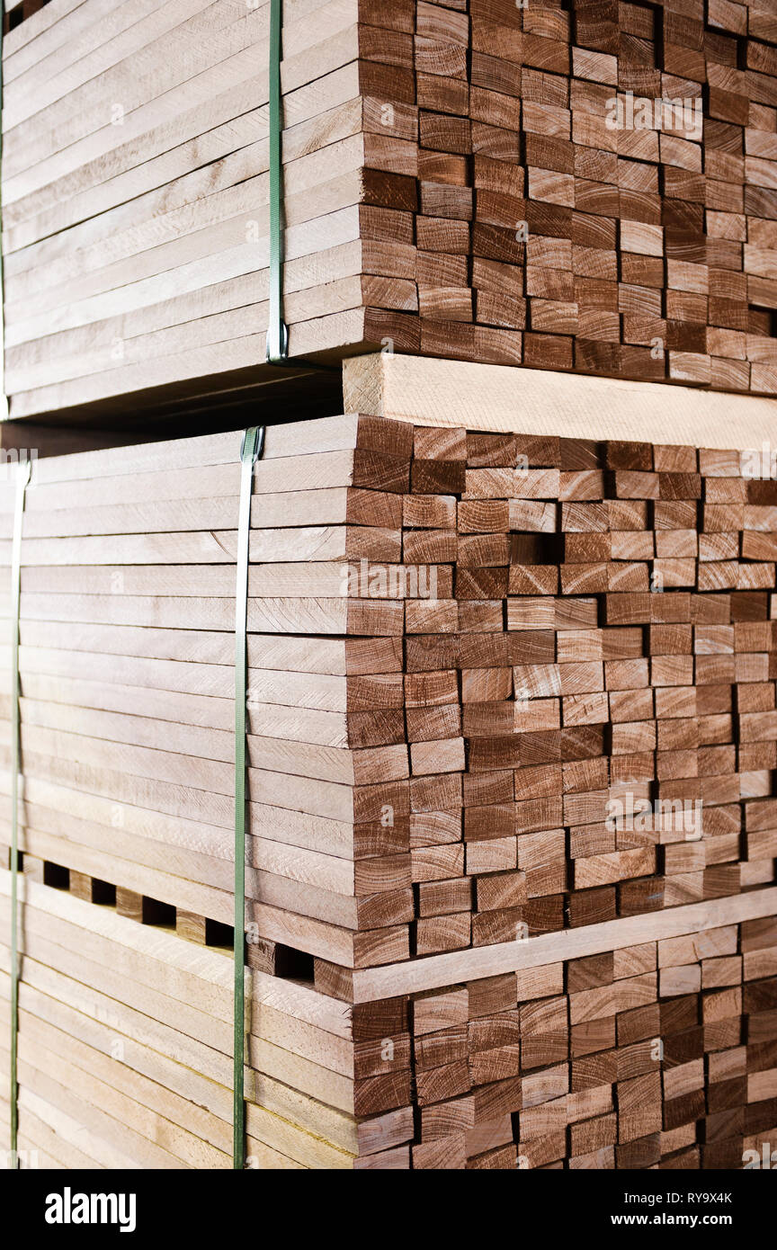 Stacks of lumber in warehouse Stock Photo - Alamy