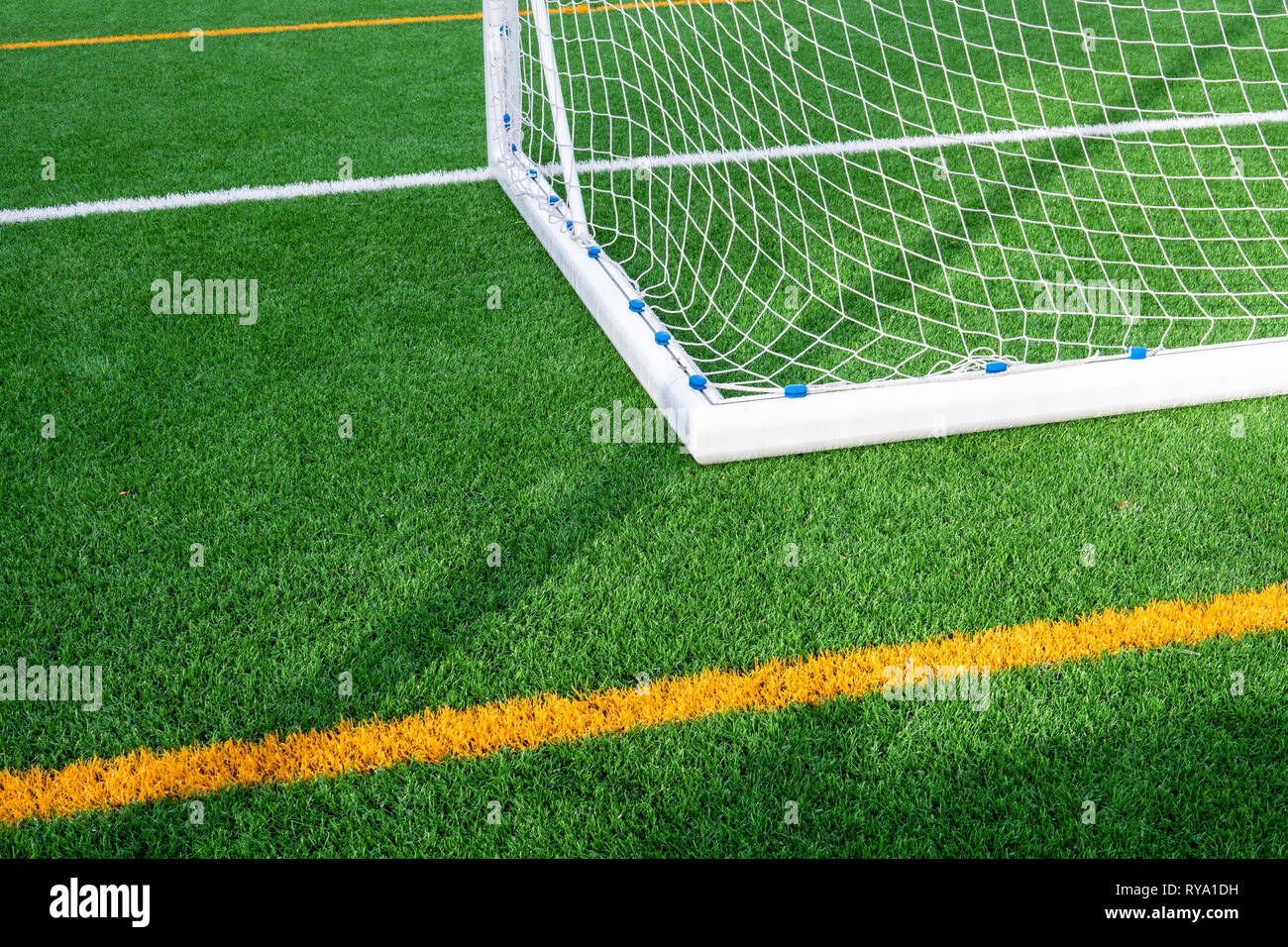 Soccer gate detail with artificial turf Stock Photo - Alamy