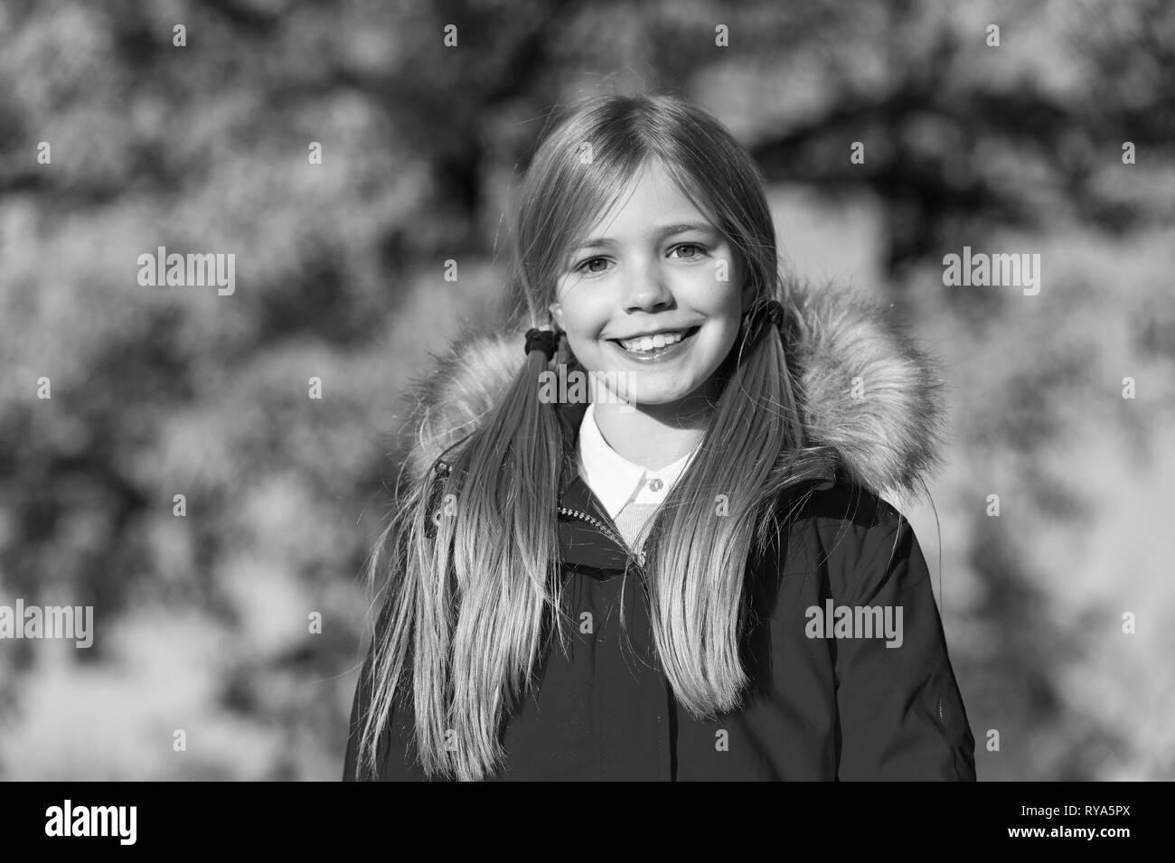 Fall fashion. Kid girl wear coat for fall season. Girl smiling face ...