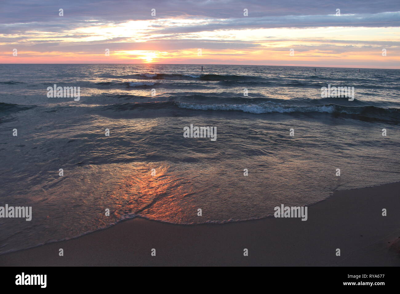 It's amazing how a blazing orange sunset can turn into a soft pinkish ...