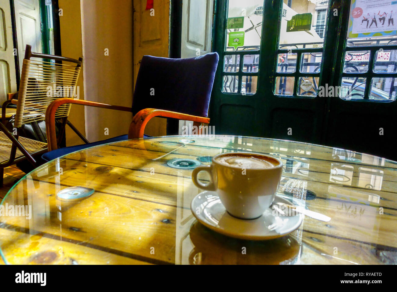 Valencia Cafe Ubik Inside, Coffee cap on a table Spain Stock Photo - Alamy