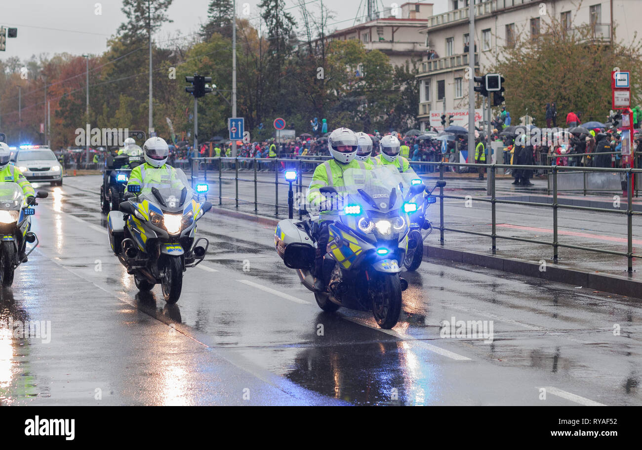 European street, Prague-October 28, 2018: Police workers are riding ...