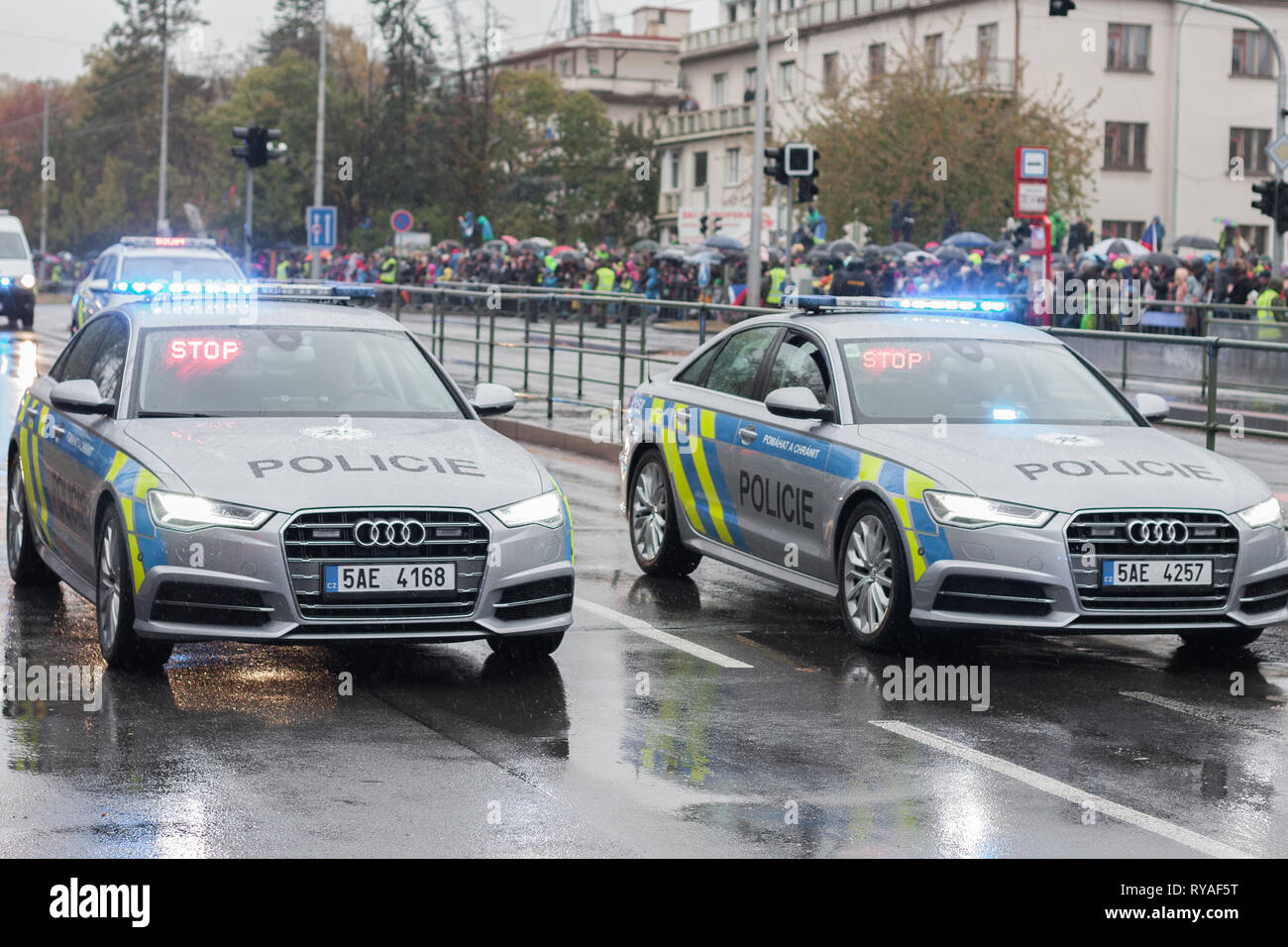 European street, Prague-October 28, 2018: Police workers riding cars on ...