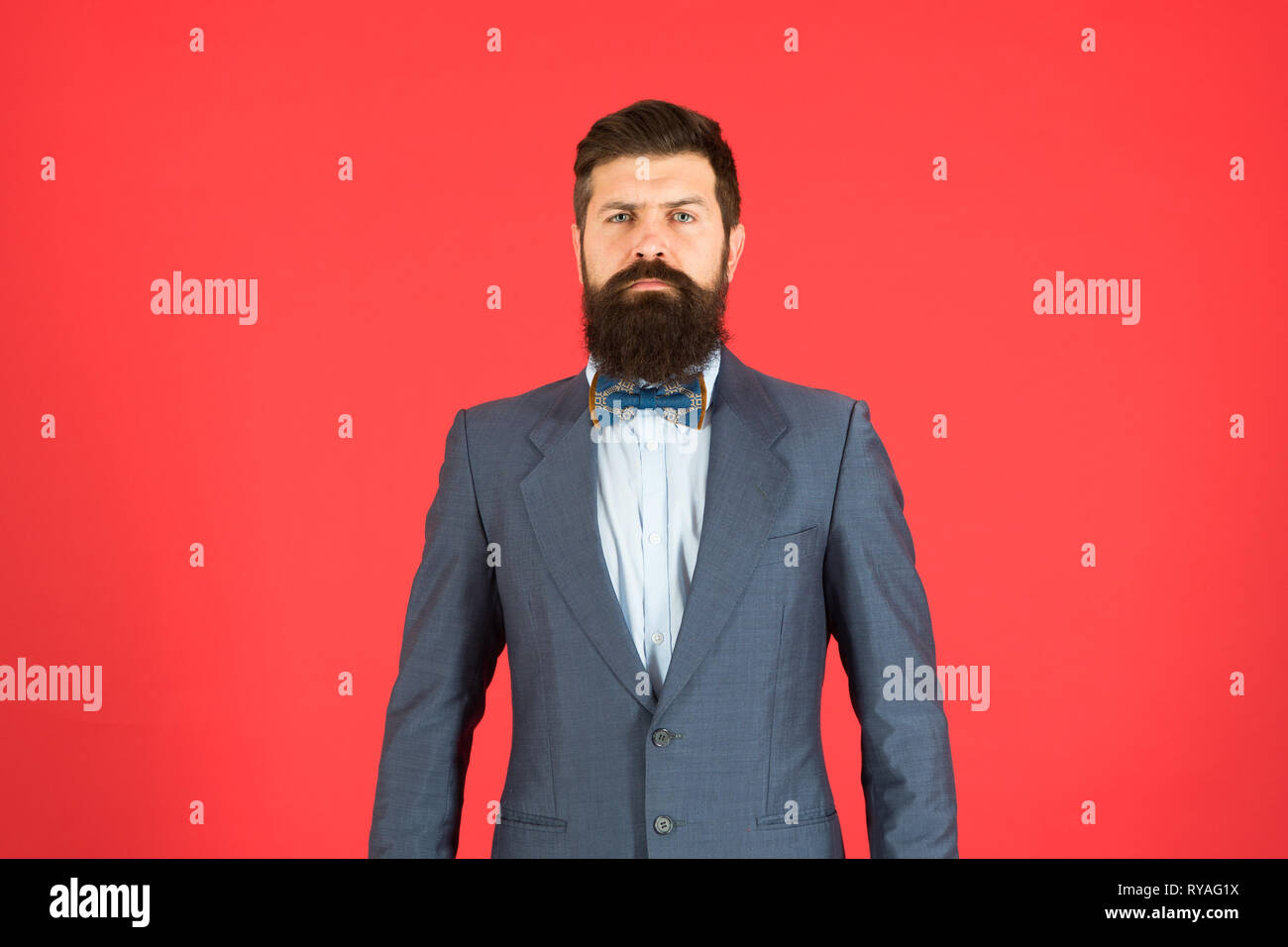 Fashion concept. Businessman or host fashionable outfit red background ...