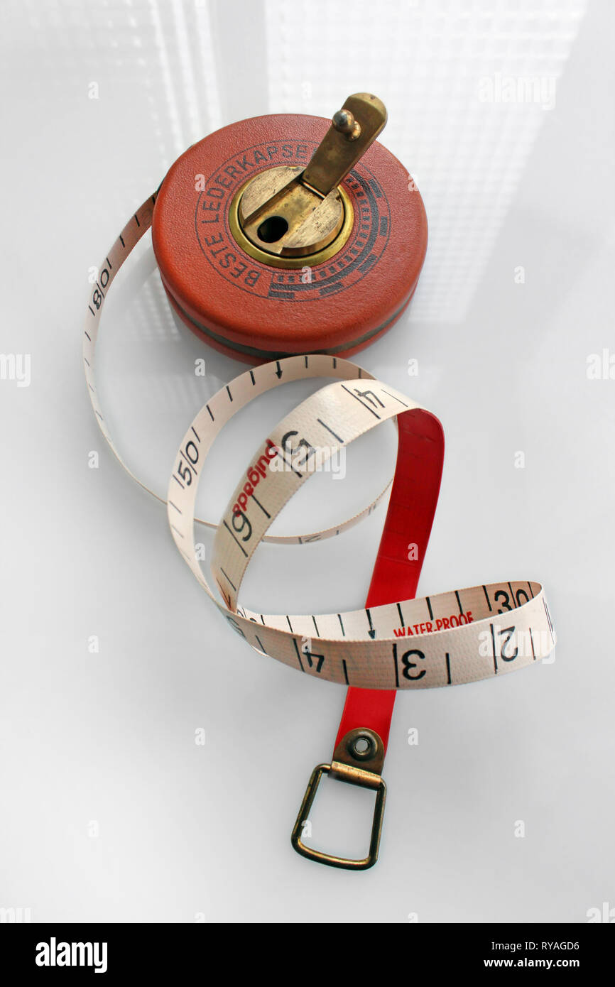 Old german roll measuring tape, isolated on white background, close ...