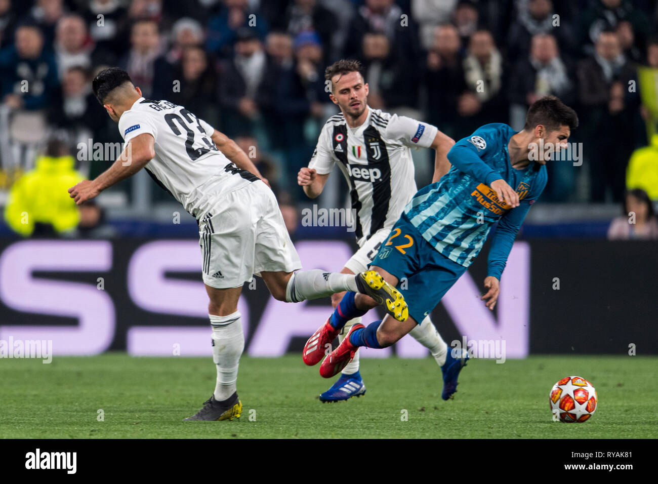 Turin, Italy. 12th Mar 2019. Emre Can (Juventus) Alvaro Borja Morata ...