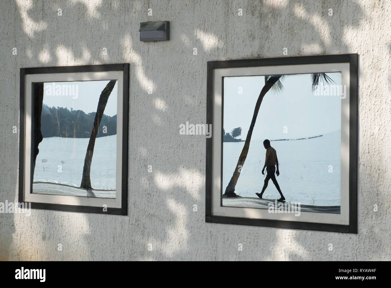 18 February 2019, São Tomé and Príncipe, Bom Bom: A man on the shore of ...
