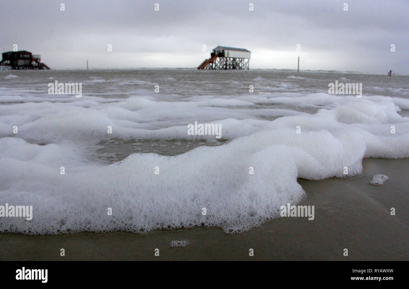 St. Peter Ording, Germany. 13th Mar, 2019. A small storm tide floods ...