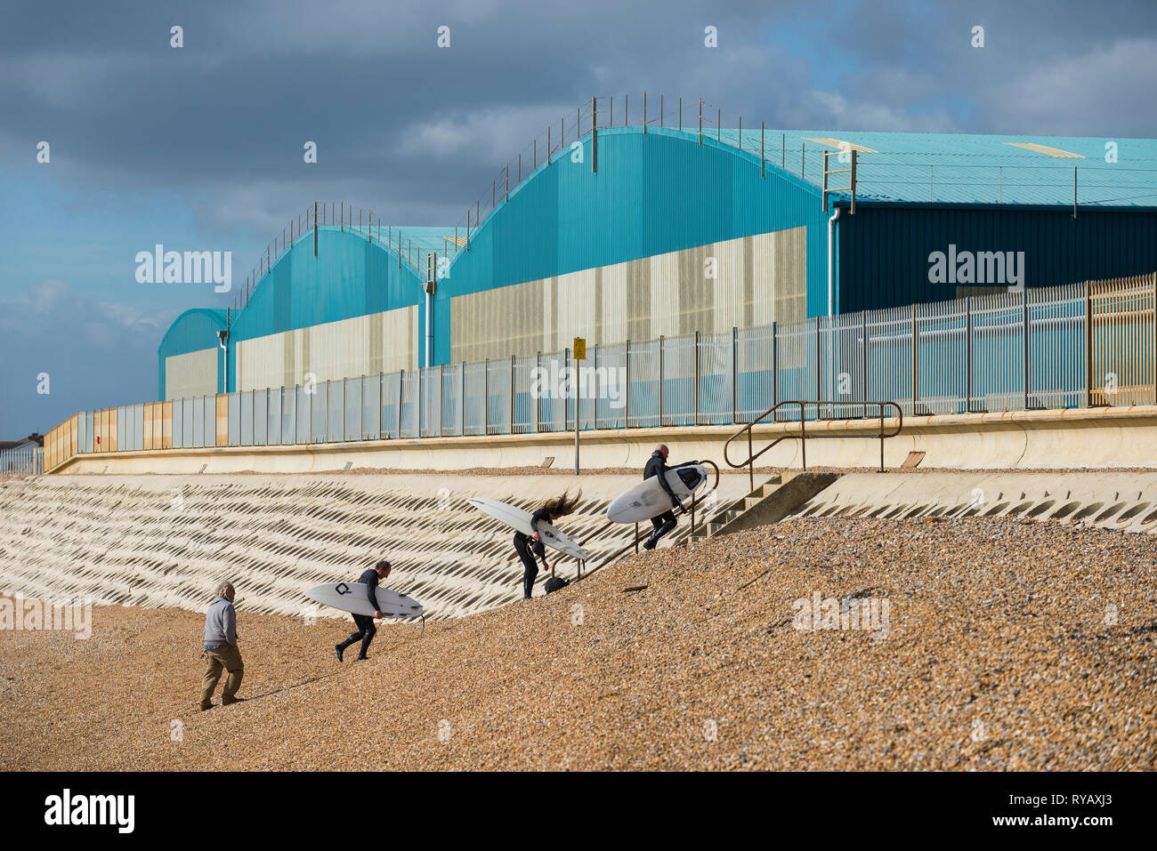 Surfers enjoy storm waves hi-res stock photography and images - Alamy