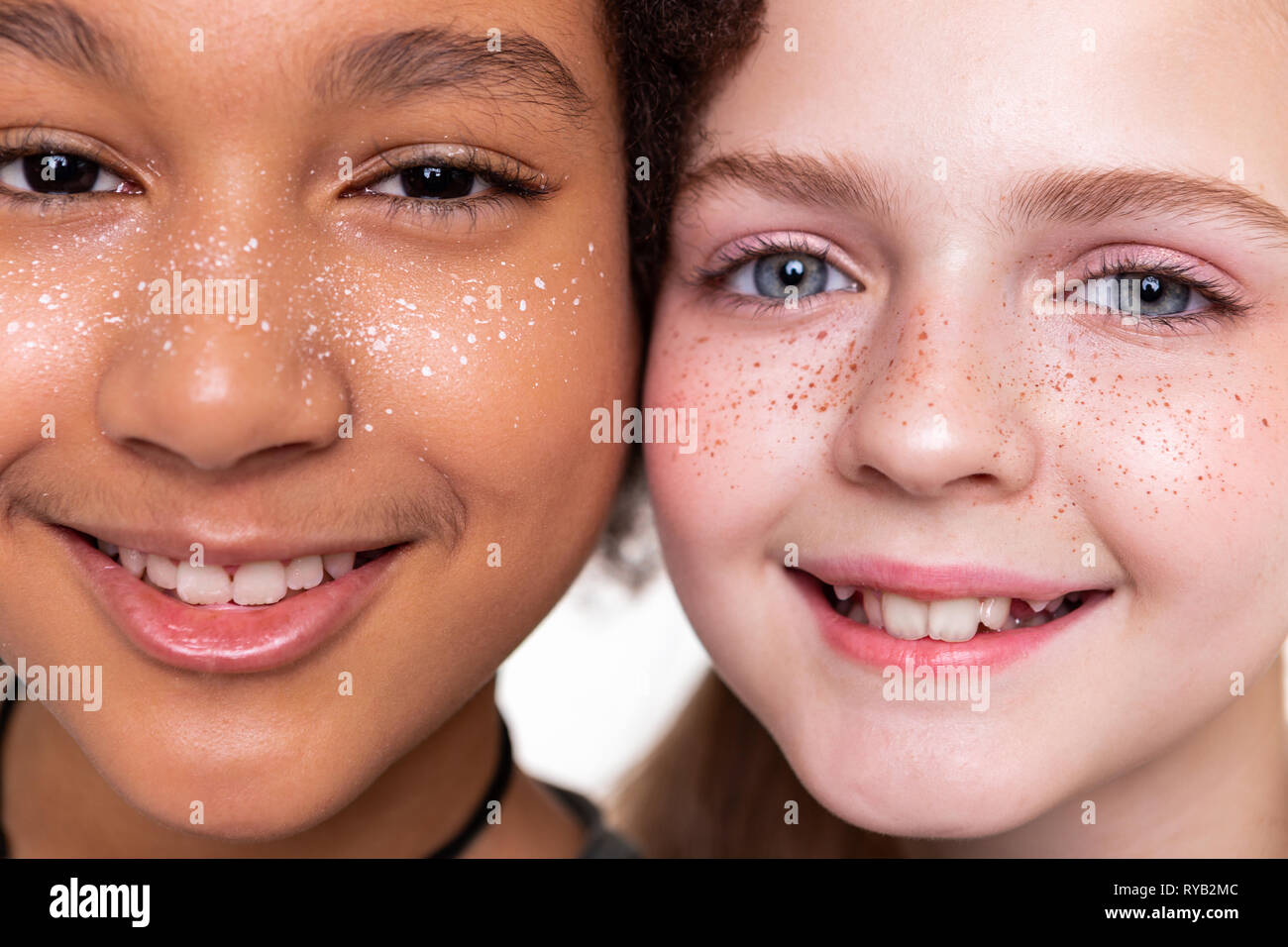 Good-looking flawless kids looking completely different while posing ...