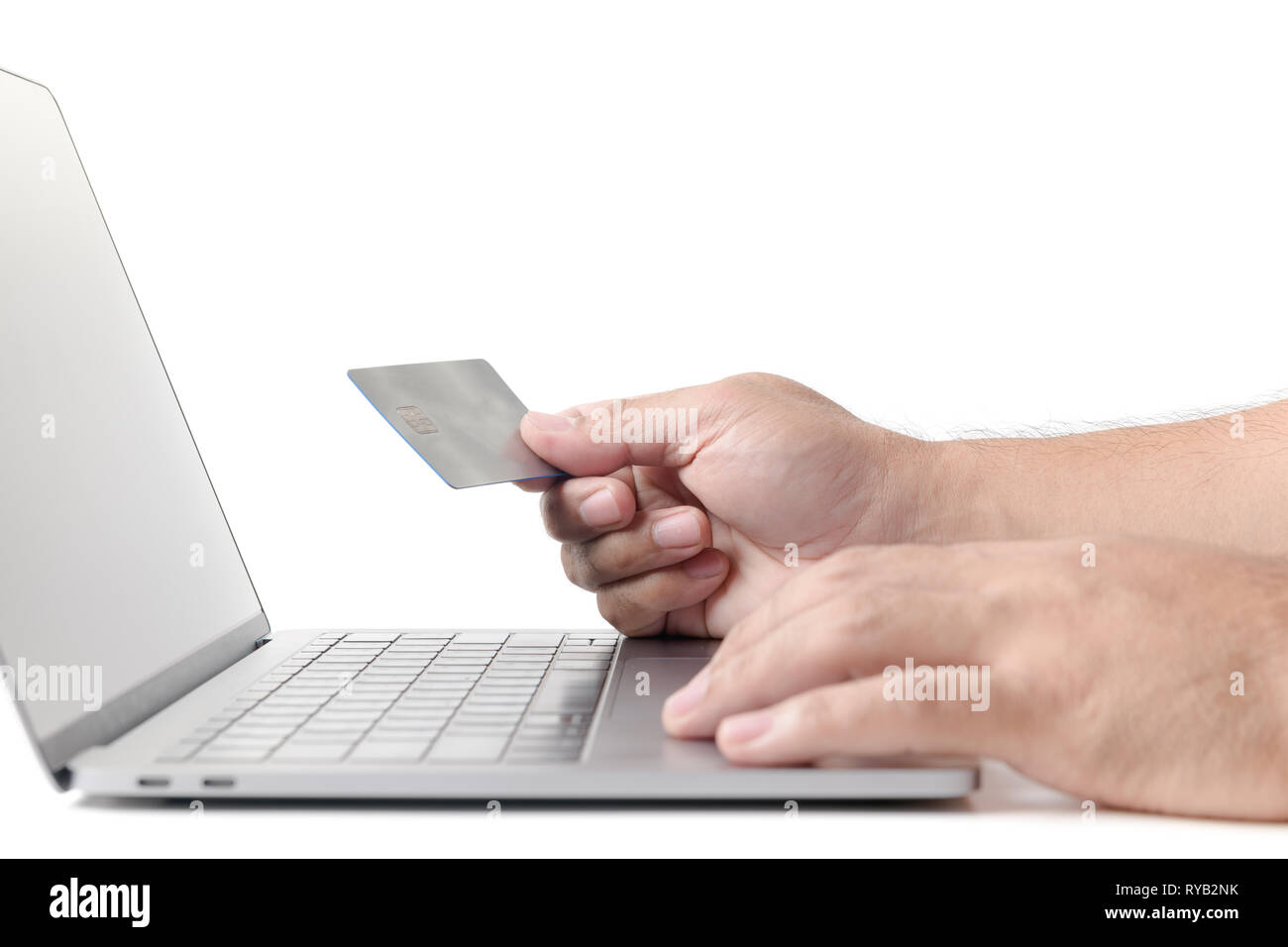 Man holding credit card on laptop isolated on white background ...