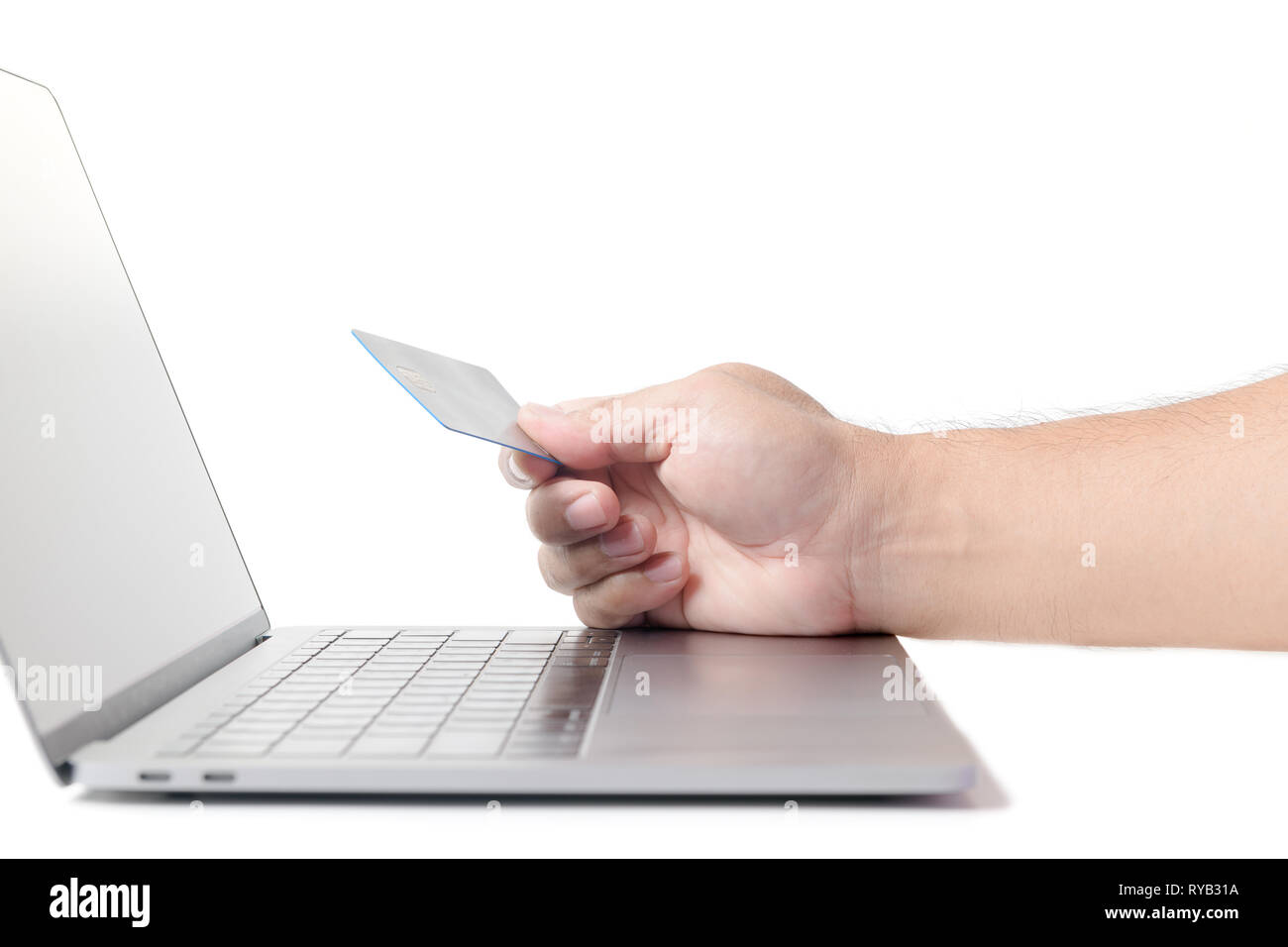 Man holding credit card on laptop isolated on white background ...