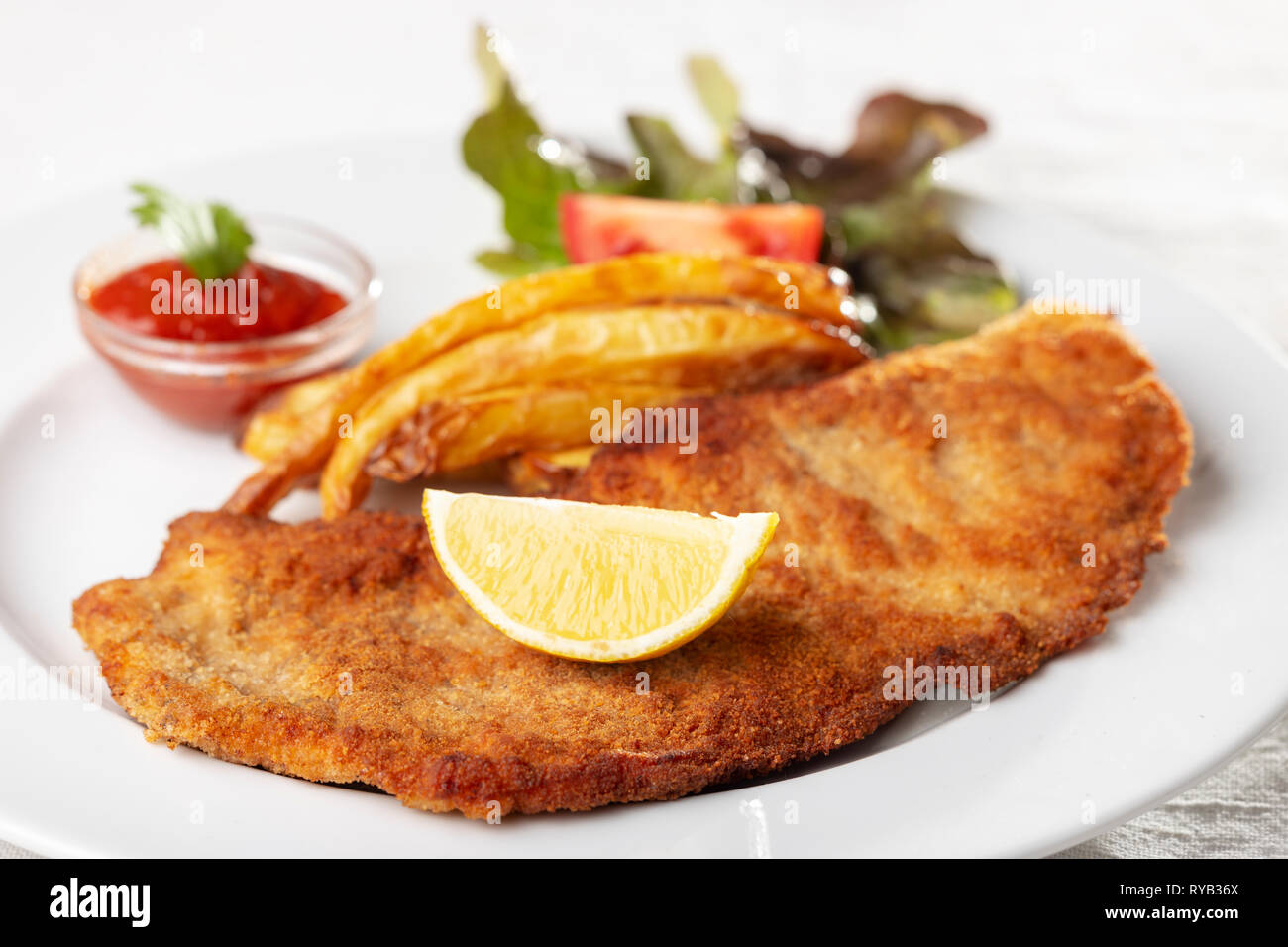 wiener schnitzel on a plate Stock Photo - Alamy