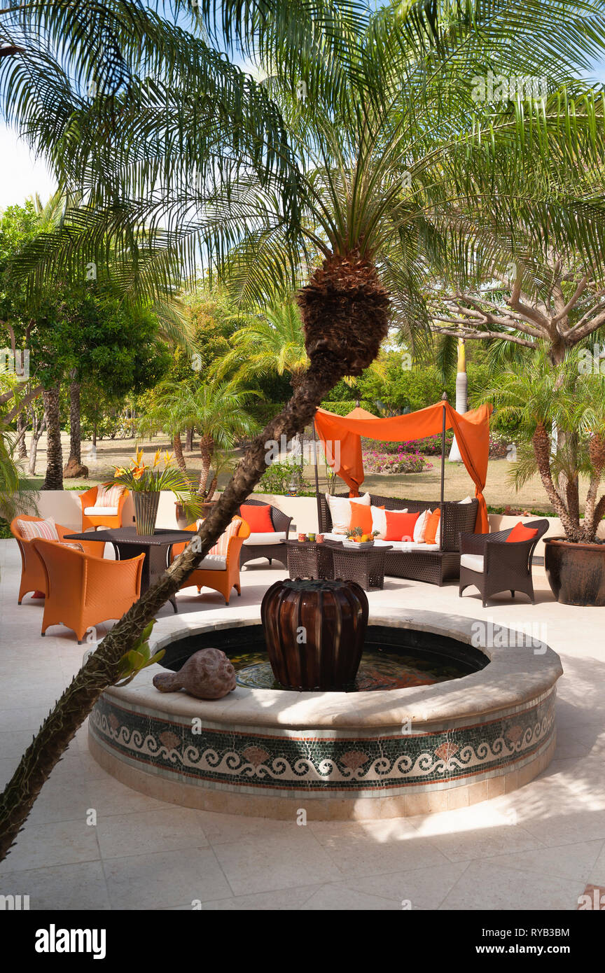 "Fountain by furniture on patio at Tamarind Cove, Antigua Stock Photo ...