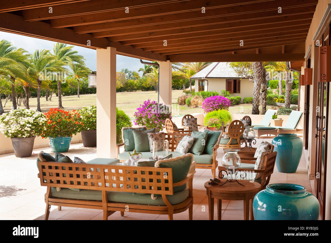 "Seating on patio at Tamarind Cove, Antigua Stock Photo - Alamy