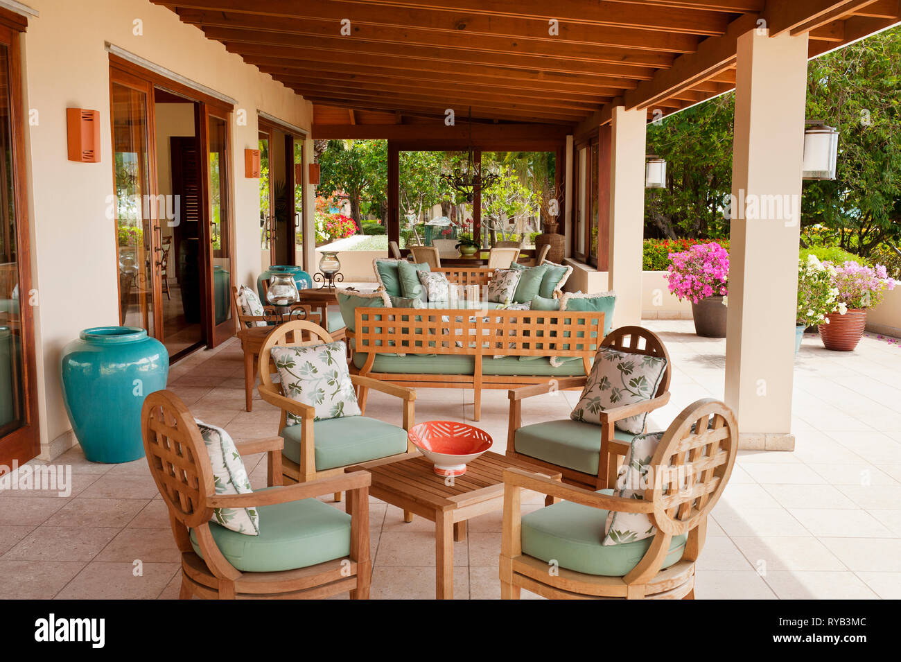 "Seating on patio at Tamarind Cove, Antigua Stock Photo - Alamy