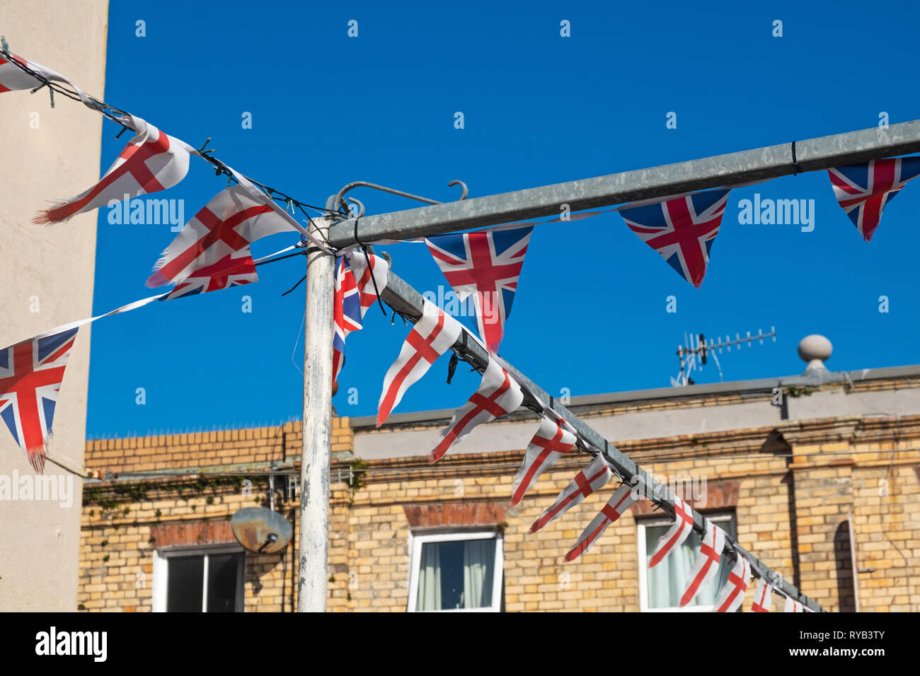 Patriotic English bunting in an urban setting Stock Photo - Alamy