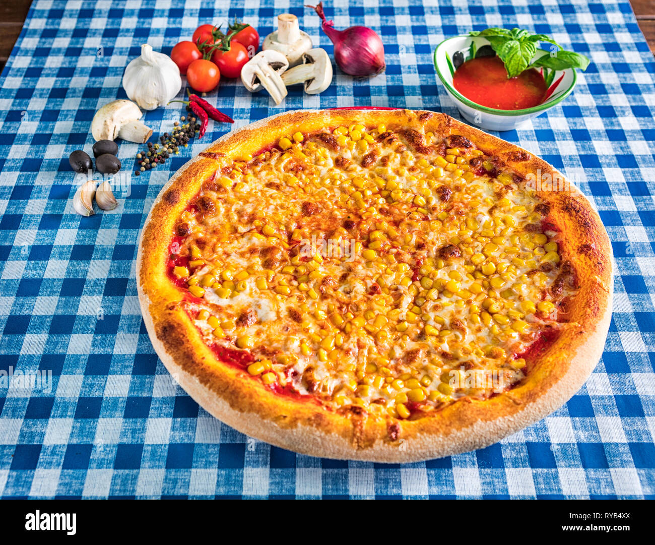 Sweetcorn pizza with cheese Stock Photo - Alamy