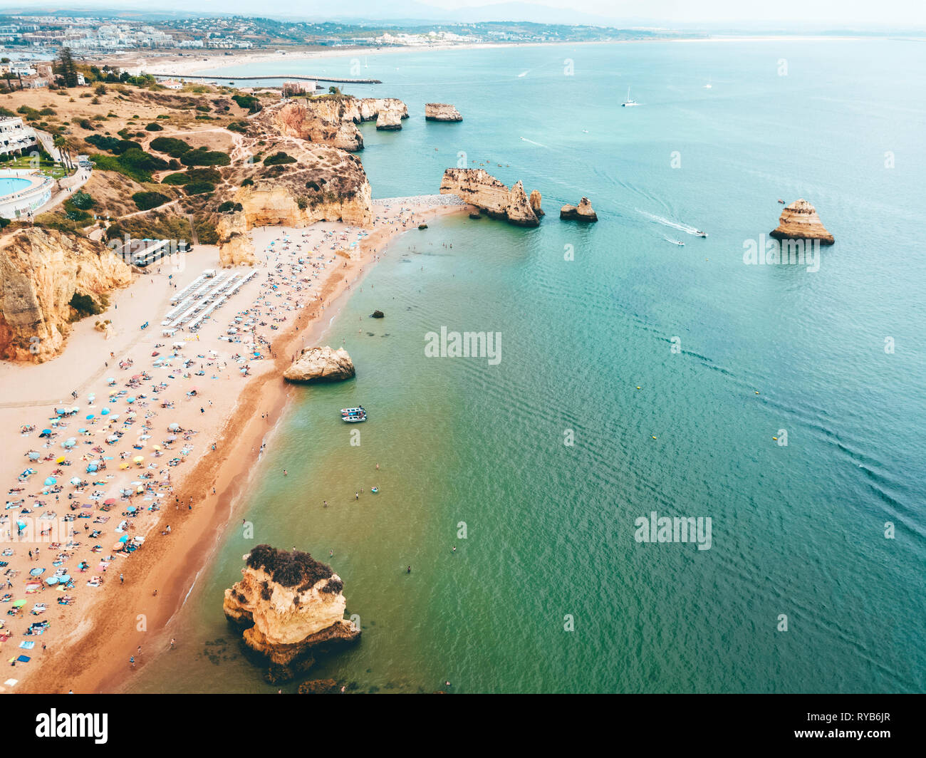 Ocean Landscape With Rocks And Cliffs At Lagos Bay Coast In Algarve ...