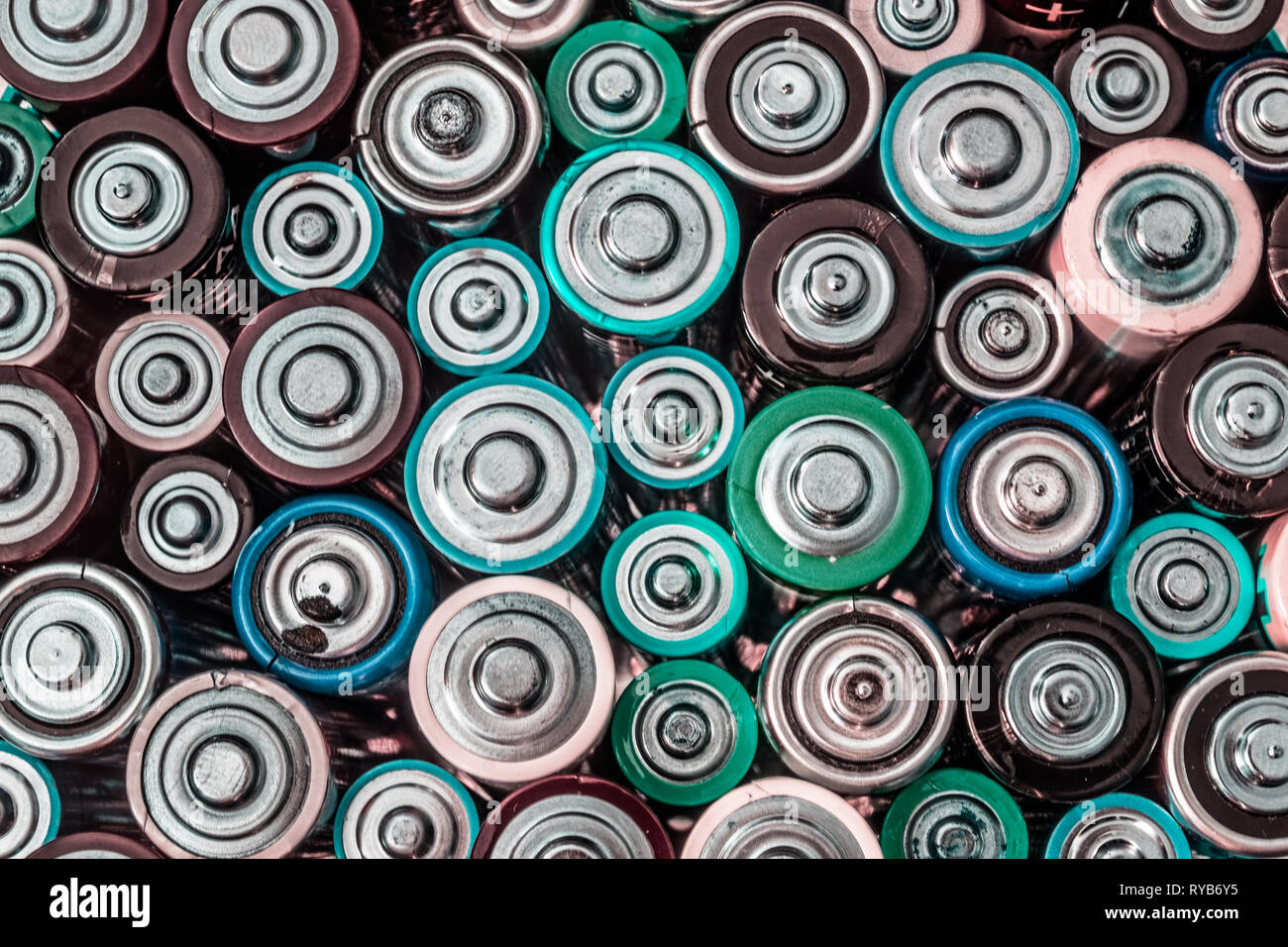 used disposable drain batteries of various size and color, top view ...