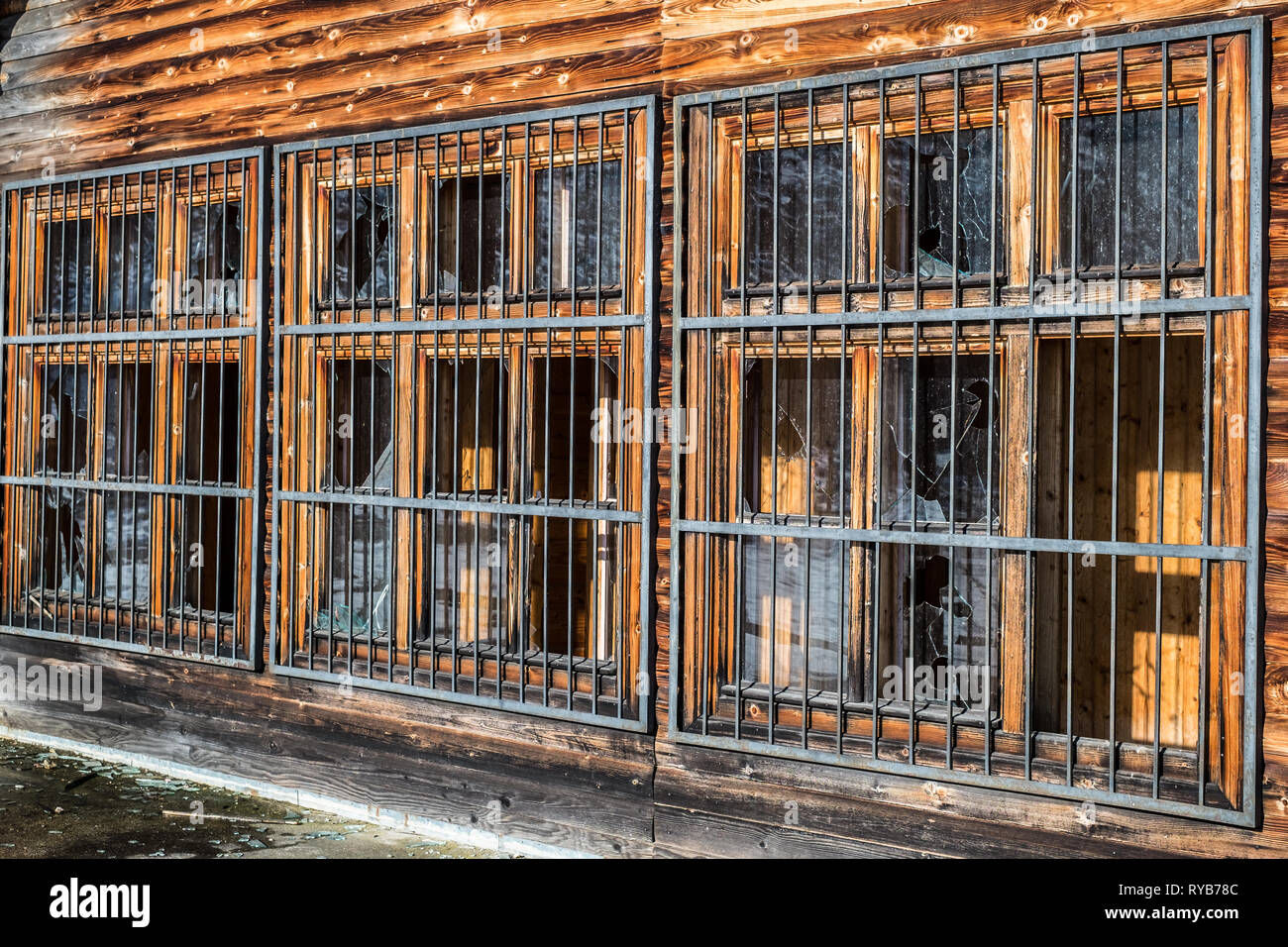 broken windows with metal grille Stock Photo - Alamy