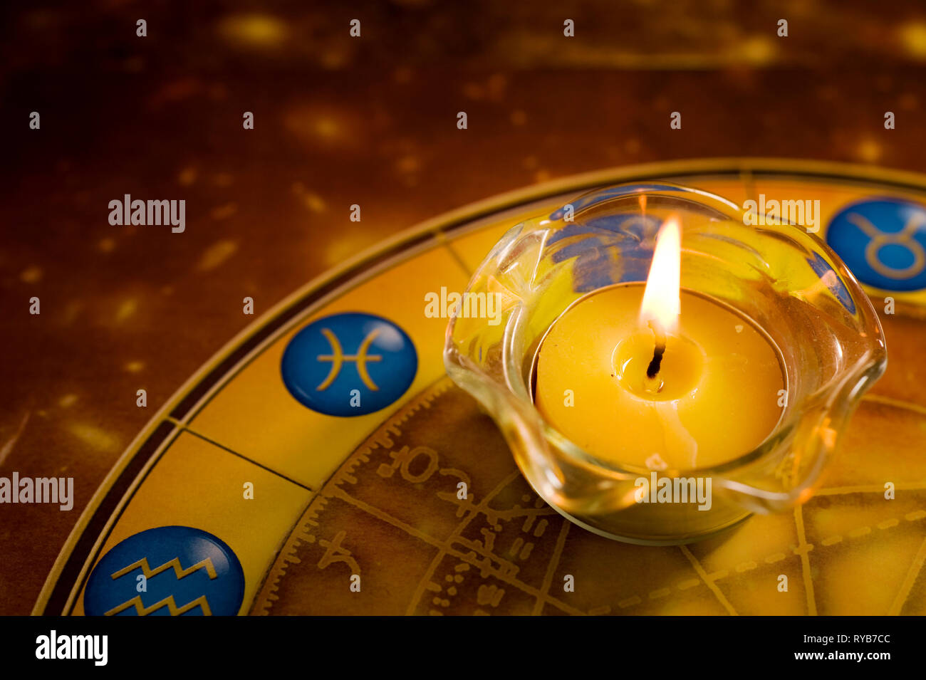 candle and astrology wheel Stock Photo - Alamy