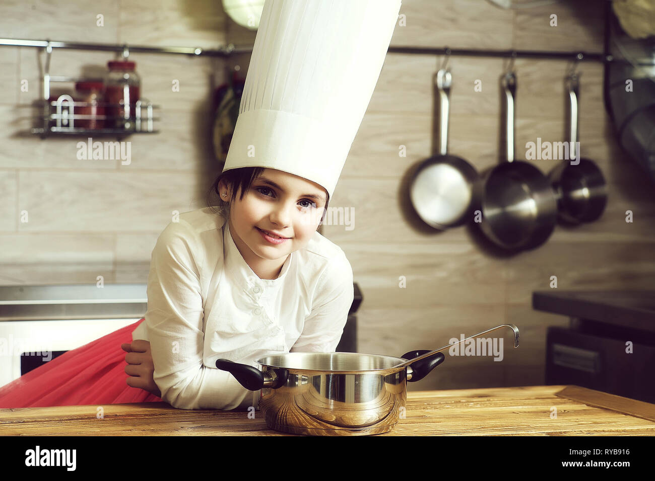 Small cook girl Stock Photo - Alamy