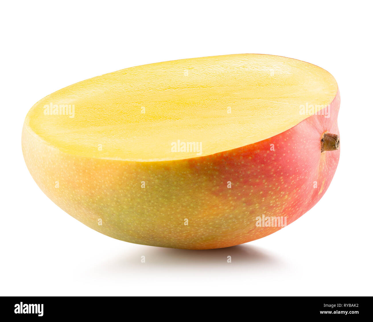 half of mango isolated on a white background Stock Photo - Alamy
