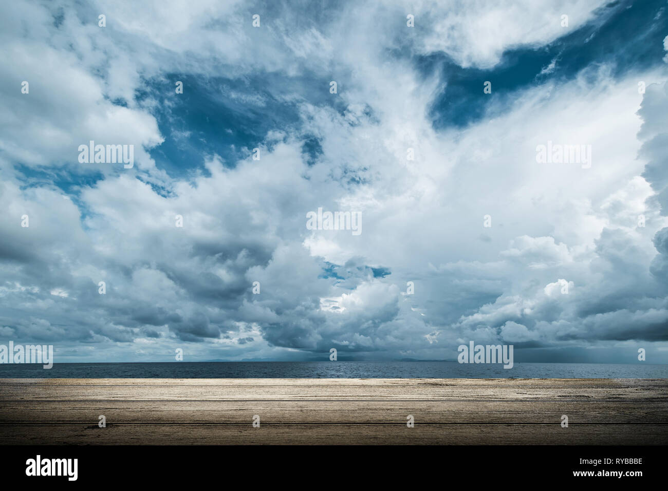 Dark clouds in open ocean Stock Photo - Alamy