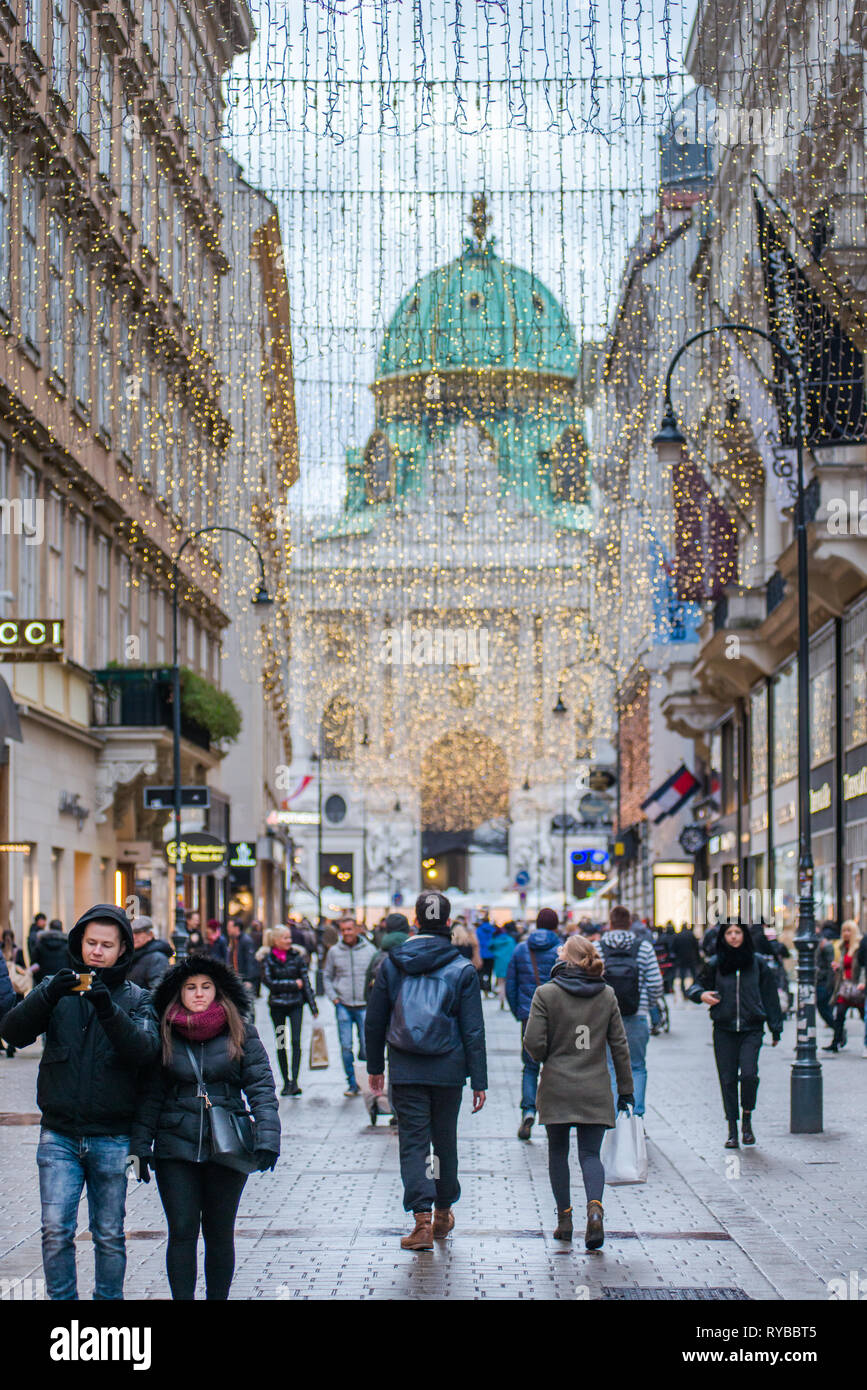 Upmarket Kohlmarkt with Hofburg palace to the rear, in Vienna city ...