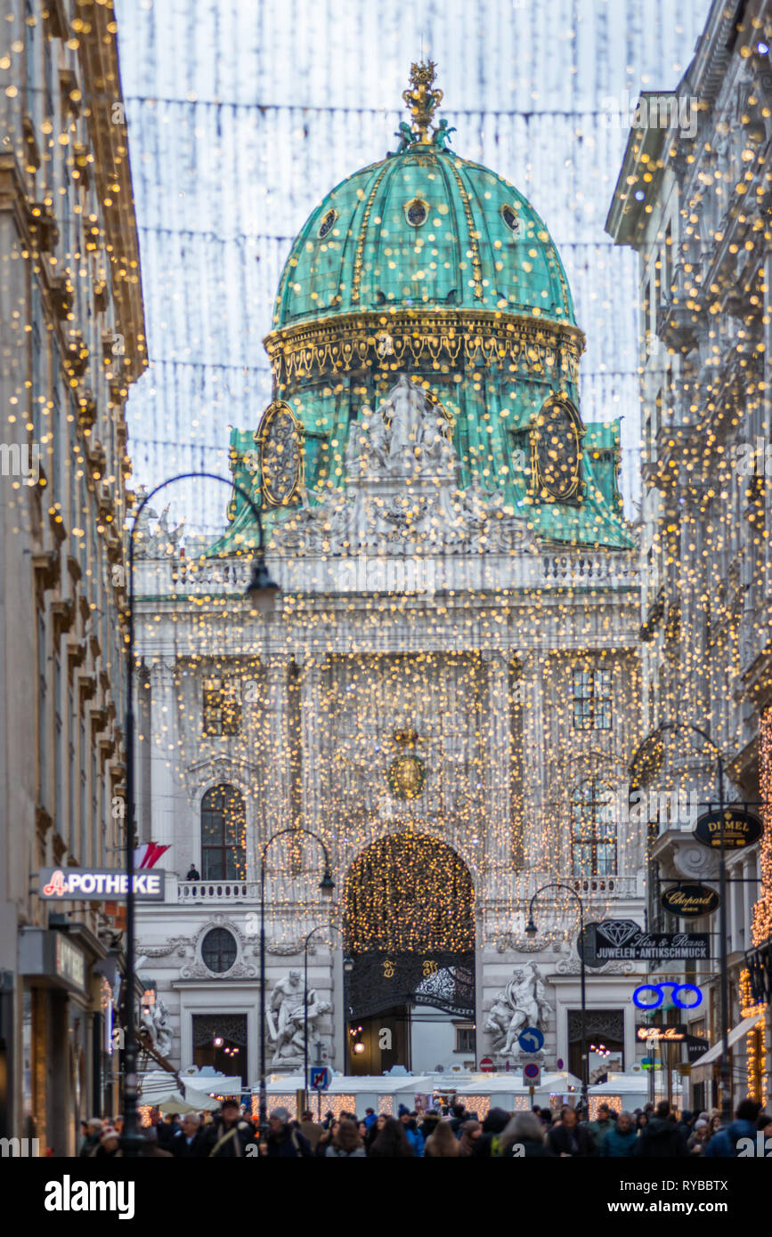 Upmarket Kohlmarkt with Hofburg palace to the rear, in Vienna city ...