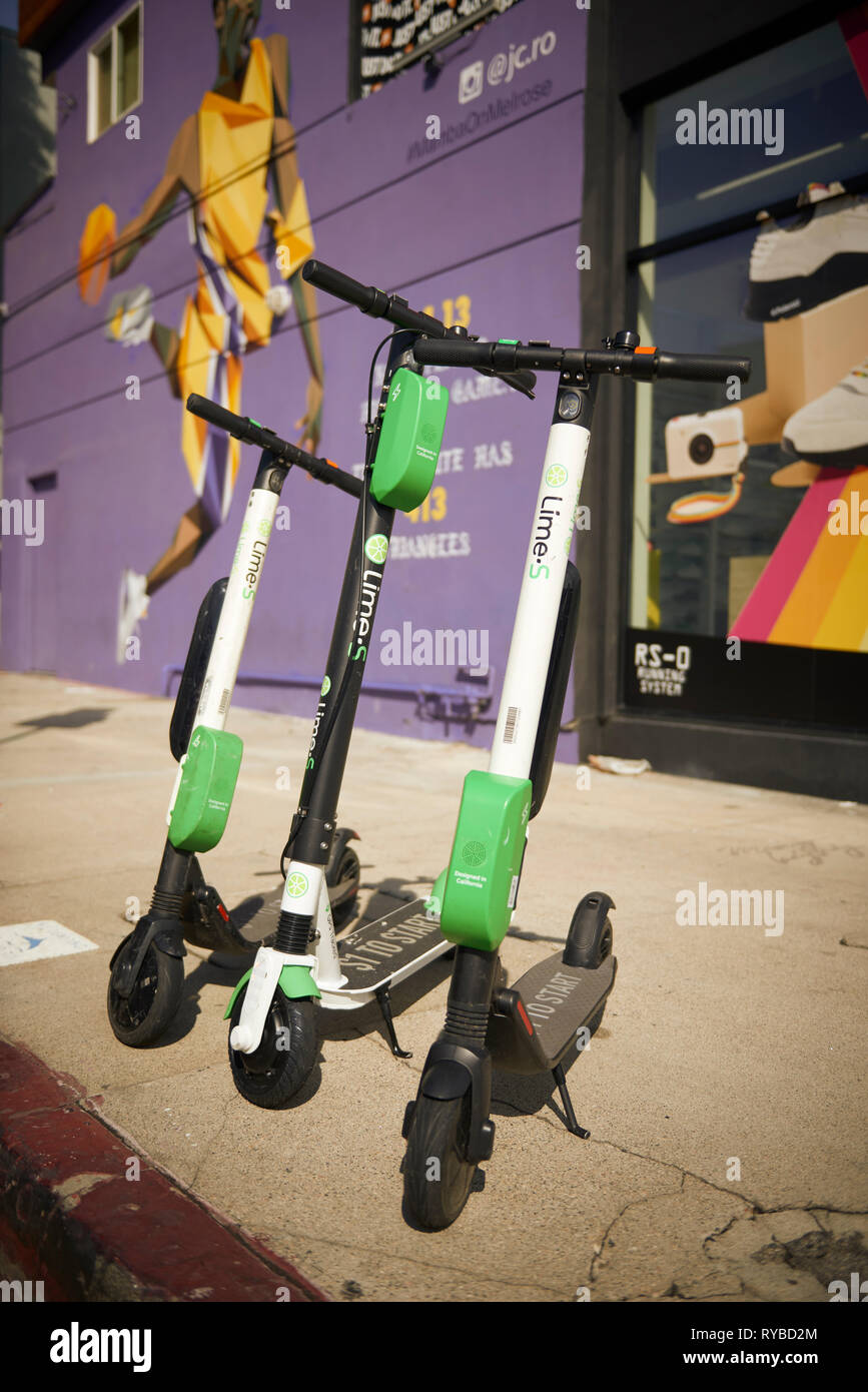 Electric E Scooters for hire on the street, Los Angeles Stock Photo - Alamy