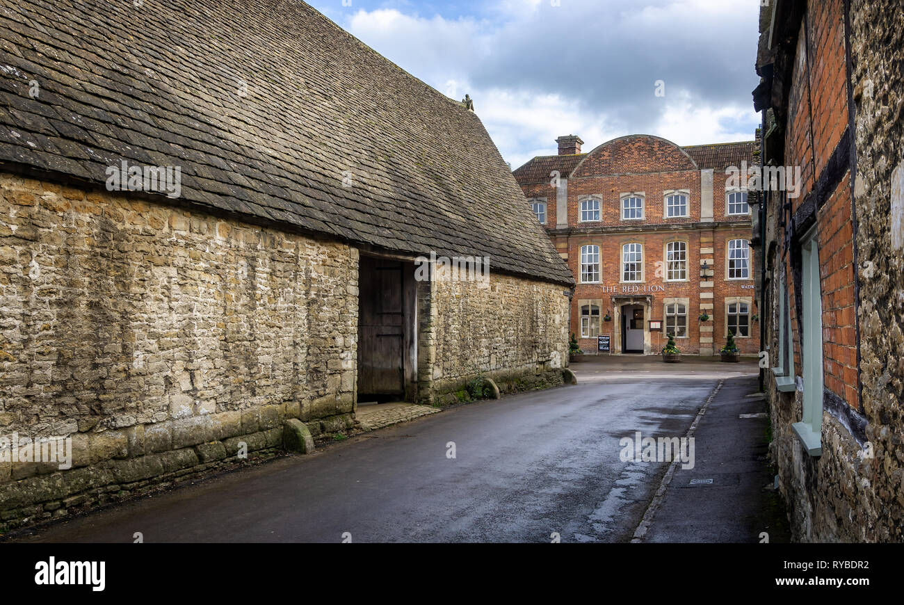14th Centruy Tithe Barn and The Red Lion Inn in Lacock, Wiltshire, UK ...